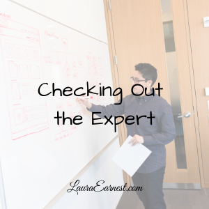 Checking Out the Expert - Laura Earnest
